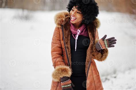 Curly Hair African American Woman Wear On Sheepskin Coat And Gloves Posed At Winter Day