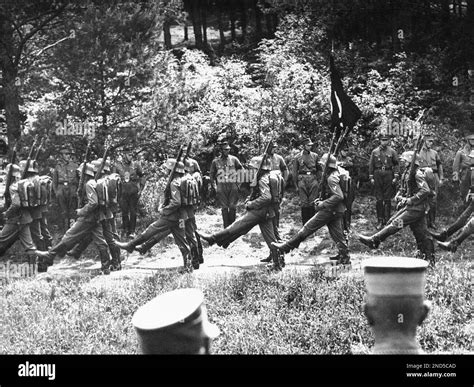 An Honor Detachment Of The Army Goose Stepping During The Parade Before The Coffin Of The Late