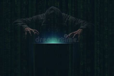 Hacker Over A Screen Green Binary Code Crime And Information Theft And