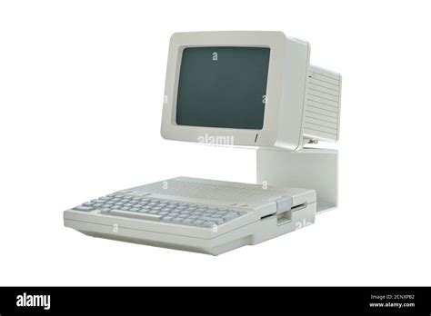 Old Vintage Desktop Computer From The Eighties With Integrated Monitor And Keyboard Isolated On