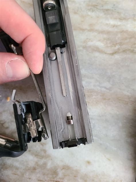 I Can Rack The Slide And The Trigger Sets But When Holding Trigger And Racking It Wont Reset