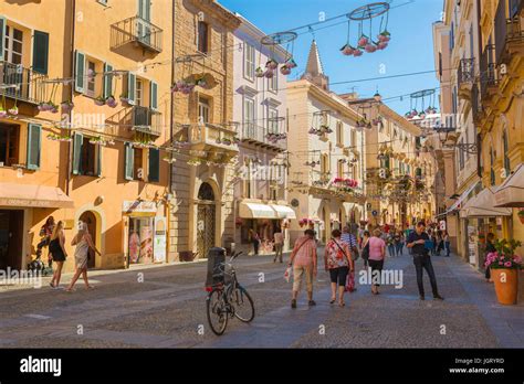 Alghero Piazza Civica People Stroll Through The Piazza Civica In The