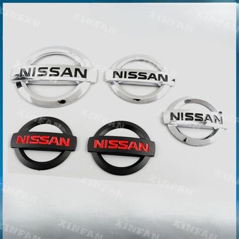 สามารถใช้ได้กับนิสสันทุกรุ่นโลโก้รถโลโก้ด้านหน้าติดท้ายรถกระจกป้ายติดรถยนต์ด้วยไฟฟ้าทำจาก Abs