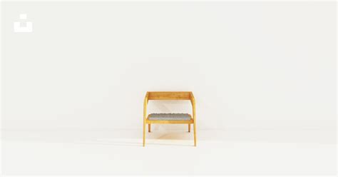 갈색 나무 프레임 회색 패딩 안락 의자 근처 흰색 페인트 벽 사진 Unsplash의 무료 내부 이미지