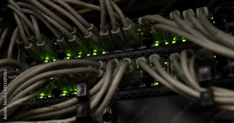 Details Of A Storage Array In A Modern Data Center With Lot Of Connectors And Blinking Leds