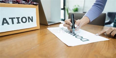 Volunteer Writing Donation Label For Community Service Project