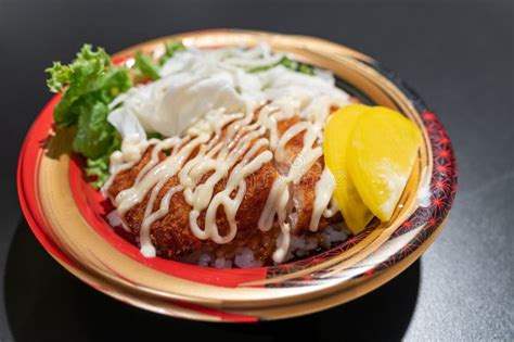 Chicken Katsu Rice Served On Bowl With Salad Sprinkled With Japanese