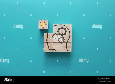 Human Head Outline On Wooden Blocks With Missing Piece Light Bulb Problem Solving Creativity