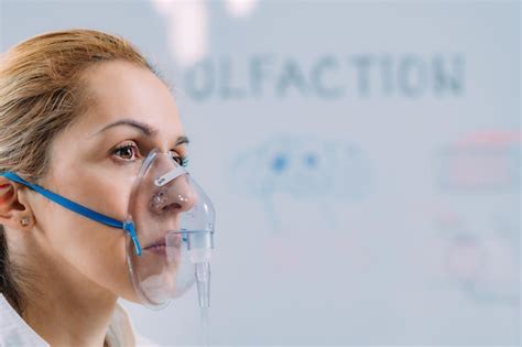 Premium Photo Olfaction Female Scientist Examining Smells With Mask