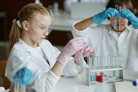 Girl Mixing Liquids During Lab Experiment Stock Photo Image Of Chemical Laboratory