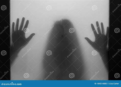 Silhouette Of A Female Behind Frosted Glass Stock Image Image Of