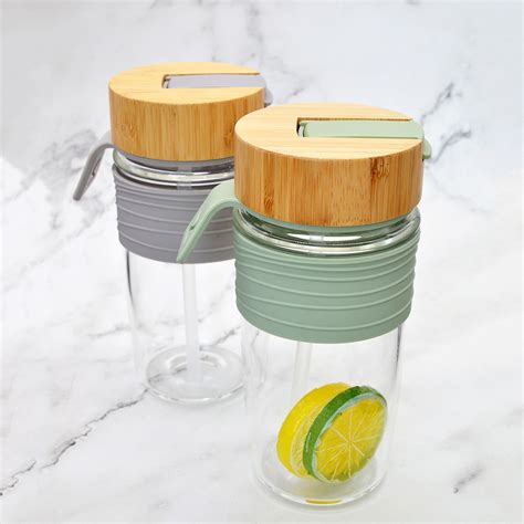 Portable Silicone Tape Borosilicate Glass Water Bottle Bamboo Flip Top Lid With Straw