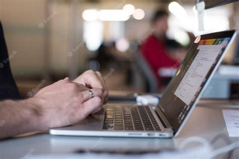 Premium Photo Software Developer Writing Programming Code On Laptop