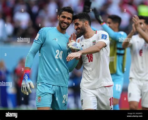 Iran Goalkeeper Hossein Hosseini Left And Ali Karimi Celebrates After