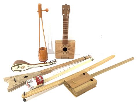 Lot 7pc Stringed Ethnic Instruments Cigar Box