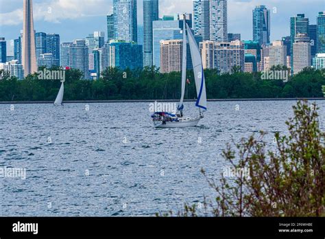 Lake Ontario Showing Skyline View Of Toronto Shoreline In Summer Stock