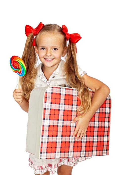 Счастливая девушка с леденцом на палочке Стоковое Фото изображение насчитывающей свирль