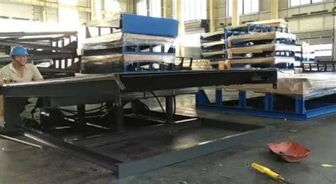 China Truck Ramp Movable Lift Table Electric Ground Level Adjustable Hydraulic Dock Leveler Dock