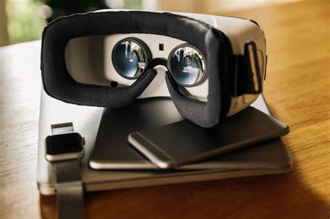 Premium Photo Stack Of Mobile Devices On Table Top