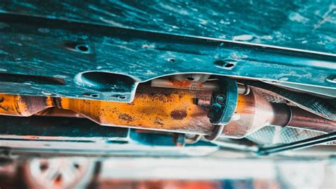 Close Up Of Old Rusted Spray Painted Exhaust Resonator Component Stock