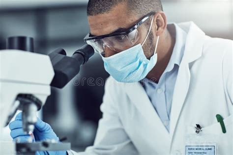 Science Is All About Observation A Male Scientist Examining The