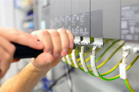 Assembly Components And Cables In A Factory In A Control Cabinet Workplace Industry With