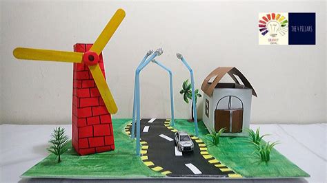 A Cake Made To Look Like A Windmill And Road