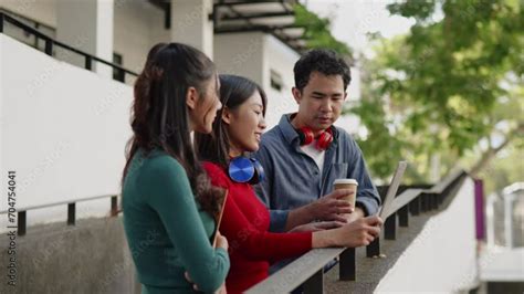 Classmate Student Friend Standing On Walkwayand Talk About Learning Content Subject In Classroom