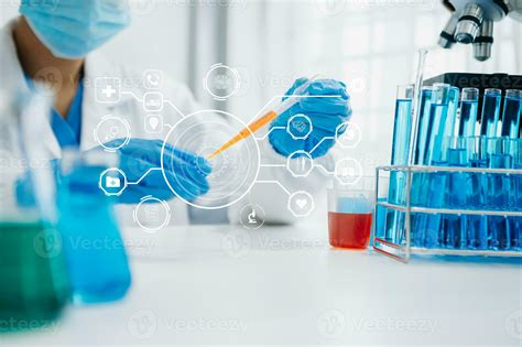 Dna Molecule Testing Concepts The Doctor In A Mask Examines Dna Molecules On The Chemical