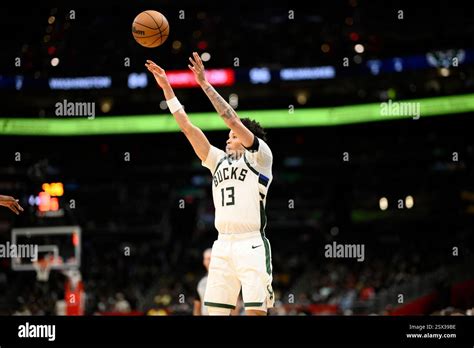 Milwaukee Bucks Guard Ryan Rollins 13 In Action During The Second