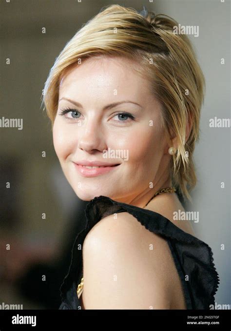 Actress Elisha Cuthbert Poses On The Red Carpet At The 2 B Free Fashion Show At Boulevard3 Night