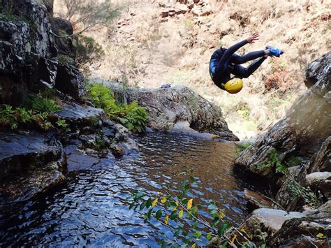 Premium Photo Man Jumping In River
