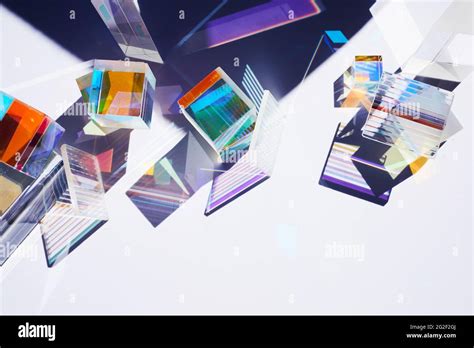 Abstract Background With Glass Geometric Figures Prisms With Light Diffraction Of Spectrum
