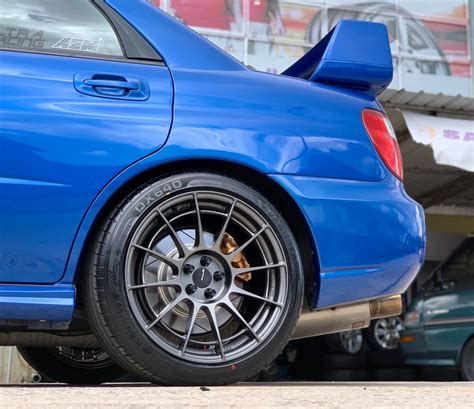 2005 Subaru WRX STI GD Blob Eye Blue Enkei NT03RR Wheel Front