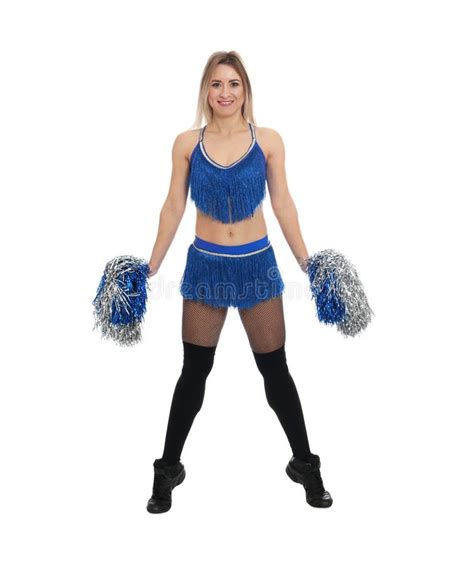 Beautiful Cheerleader In Costume Holding Pom Poms On Light Blue