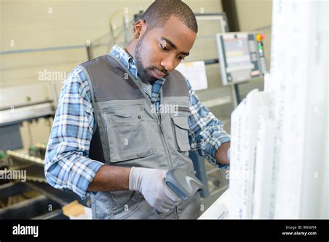 Man Scanning Package Stock Photo Alamy