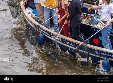 Plastic Whale Boat In A Canal In Amsterdam Passengers Fish Plastic