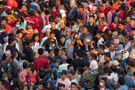 Premium Photo A Crowd Of People Are Gathered In A Crowd And One Of
