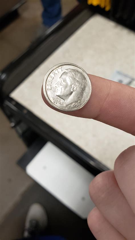 Hard To See With Naked Eye But Put The Dime Flat Between Your Fingers