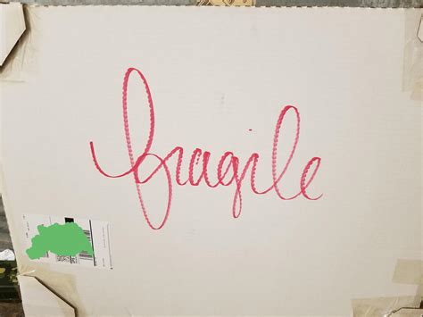 Fragile Written Beautifully On A Package At Ups Rpenmanshipporn