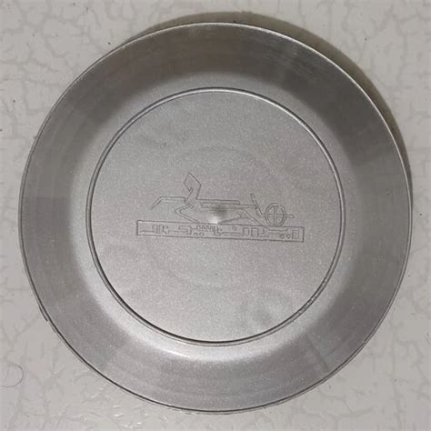 خرید و قیمت بچه قالپاق پیکان درپوش وسط چرخ ماشین پیکانی آرم کالسکه