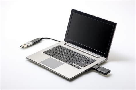 Premium Photo Wired Up Linking A USB Flash Drive To A Laptop Computer With A White Background