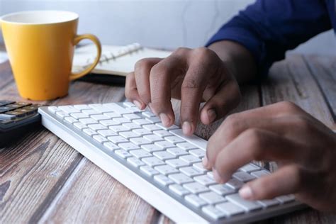 Premium Photo Close Up Of Man Hand Typing On Keyboard