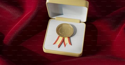 빨간 천 위에 놓인 금메달 사진 Unsplash의 트로피 이미지